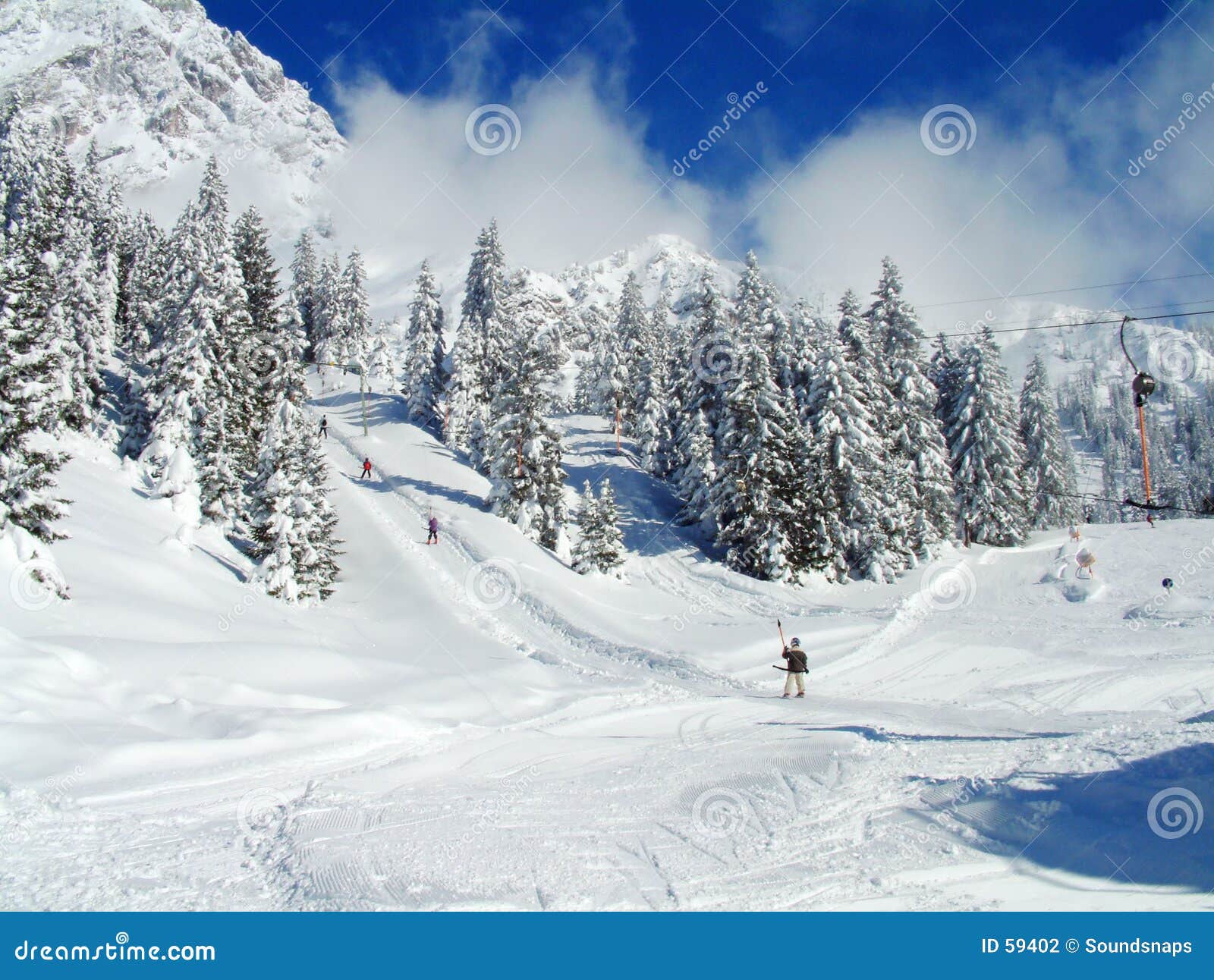 Alpine Skiers on Snowy Slopes Stock Photo - Image of seasonal, tirol: 59402