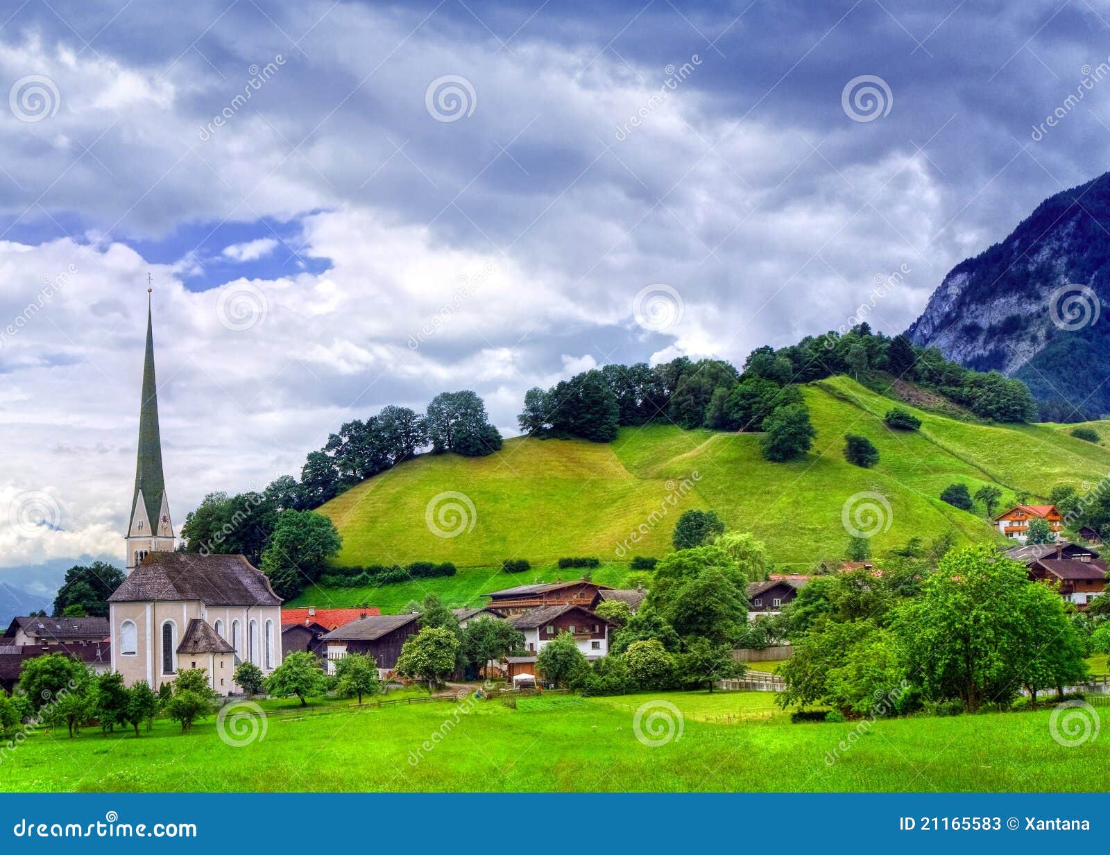 Alpine village stock image. Image of spire, holiday, grass - 21165583