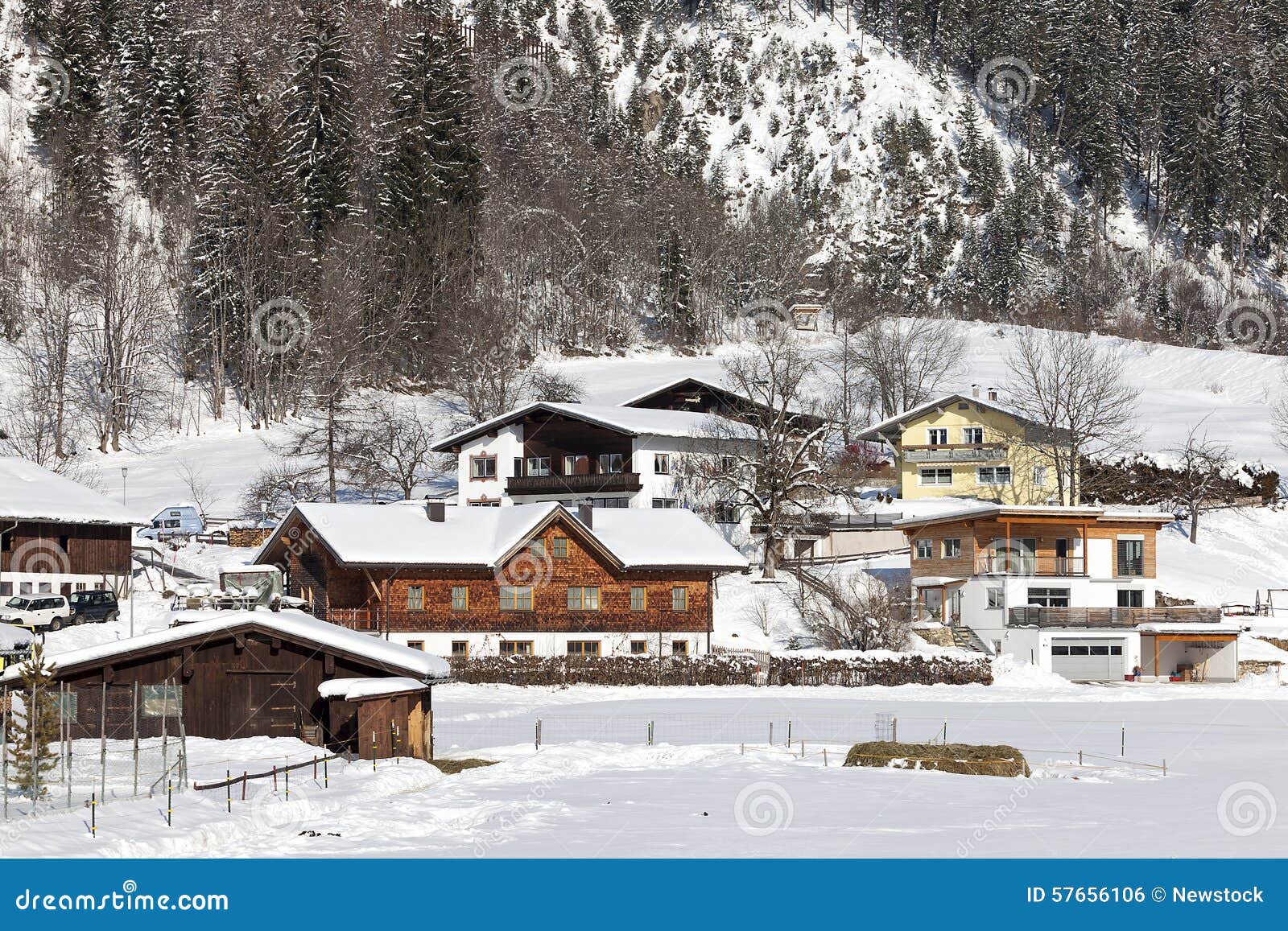 Alpine village in the snow stock photo. Image of nature - 57656106