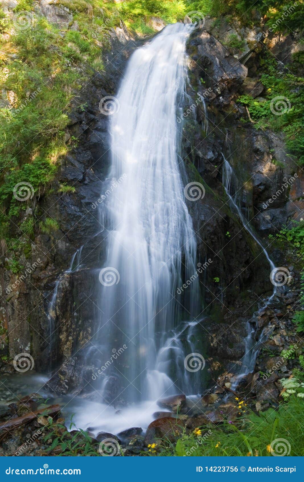 Alpine waterfall stock photo. Image of snow, rock, clouds - 14223756