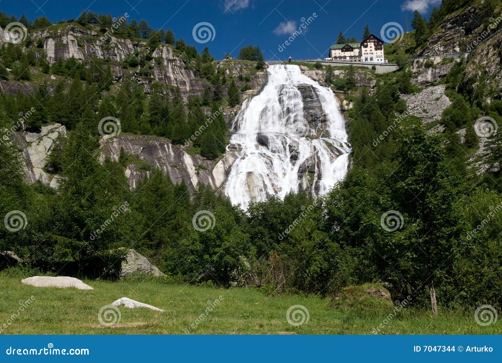 Alpine waterfall stock photo. Image of water, meadow, nature - 7047344