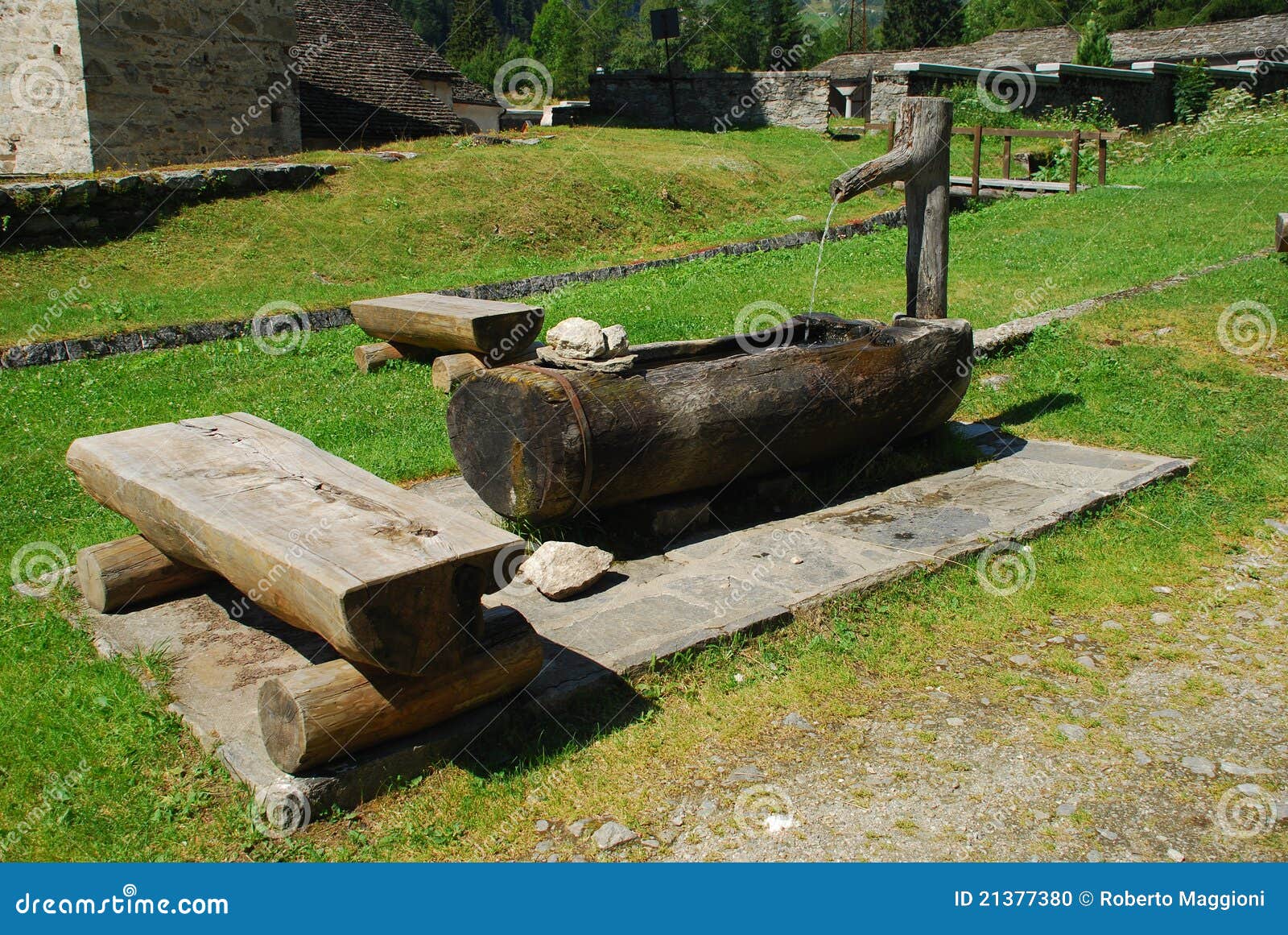 Alpine wood water fountain stock photo. Image of travel - 21377380