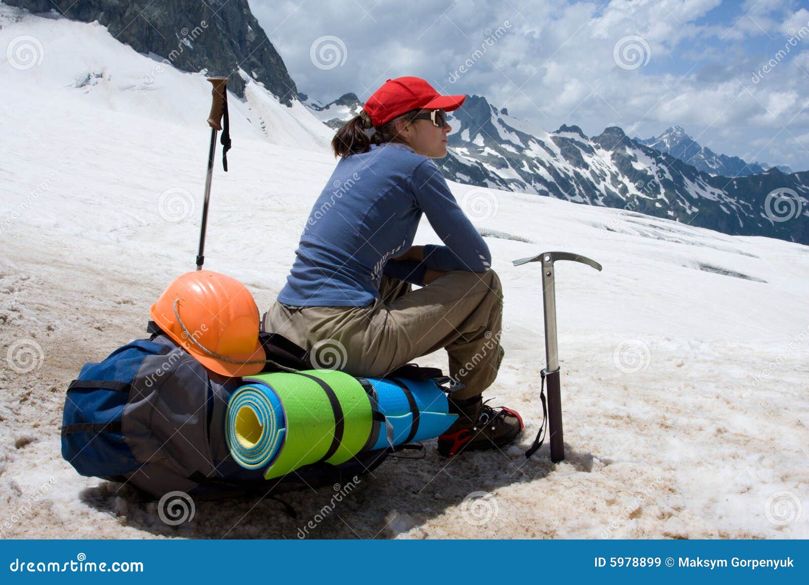 Alpinist Woman Sitting on Her Backpack Stock Image - Image of alpinist ...