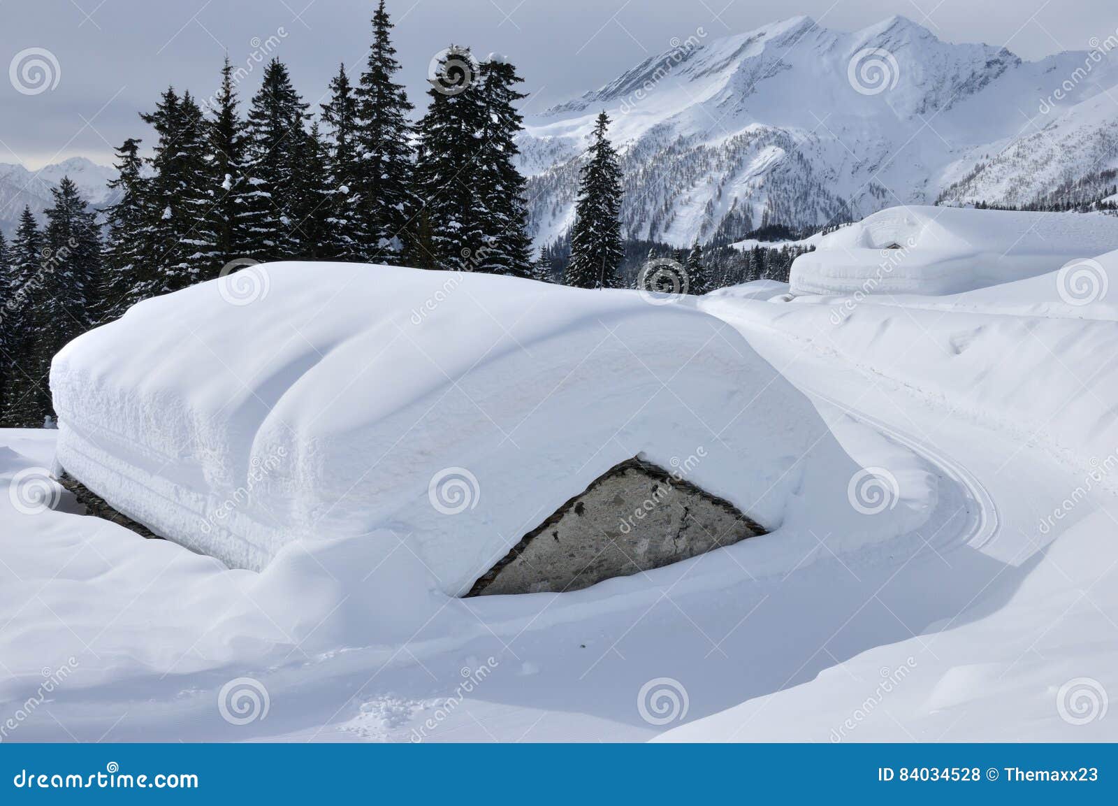 Alps huts covered by snow stock photo. Image of traditional - 84034528