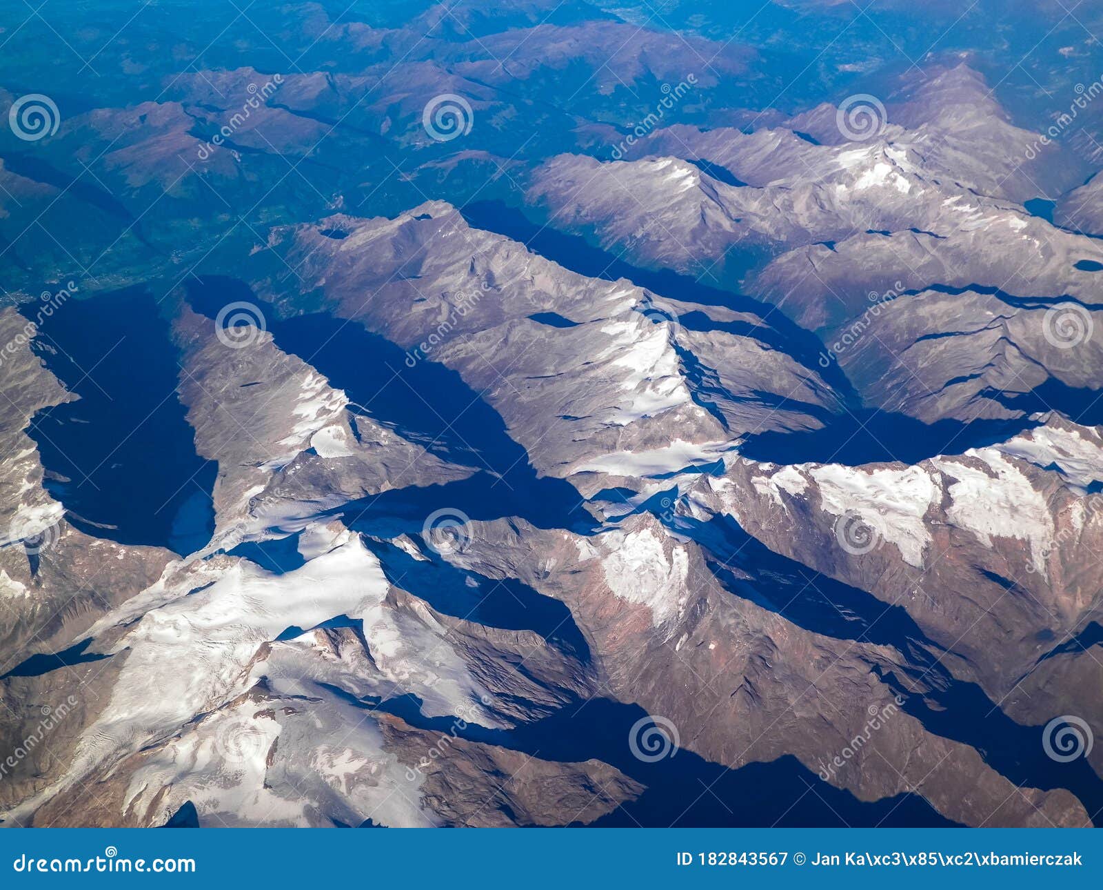 Alps from plane window stock image. Image of environmental - 182843567