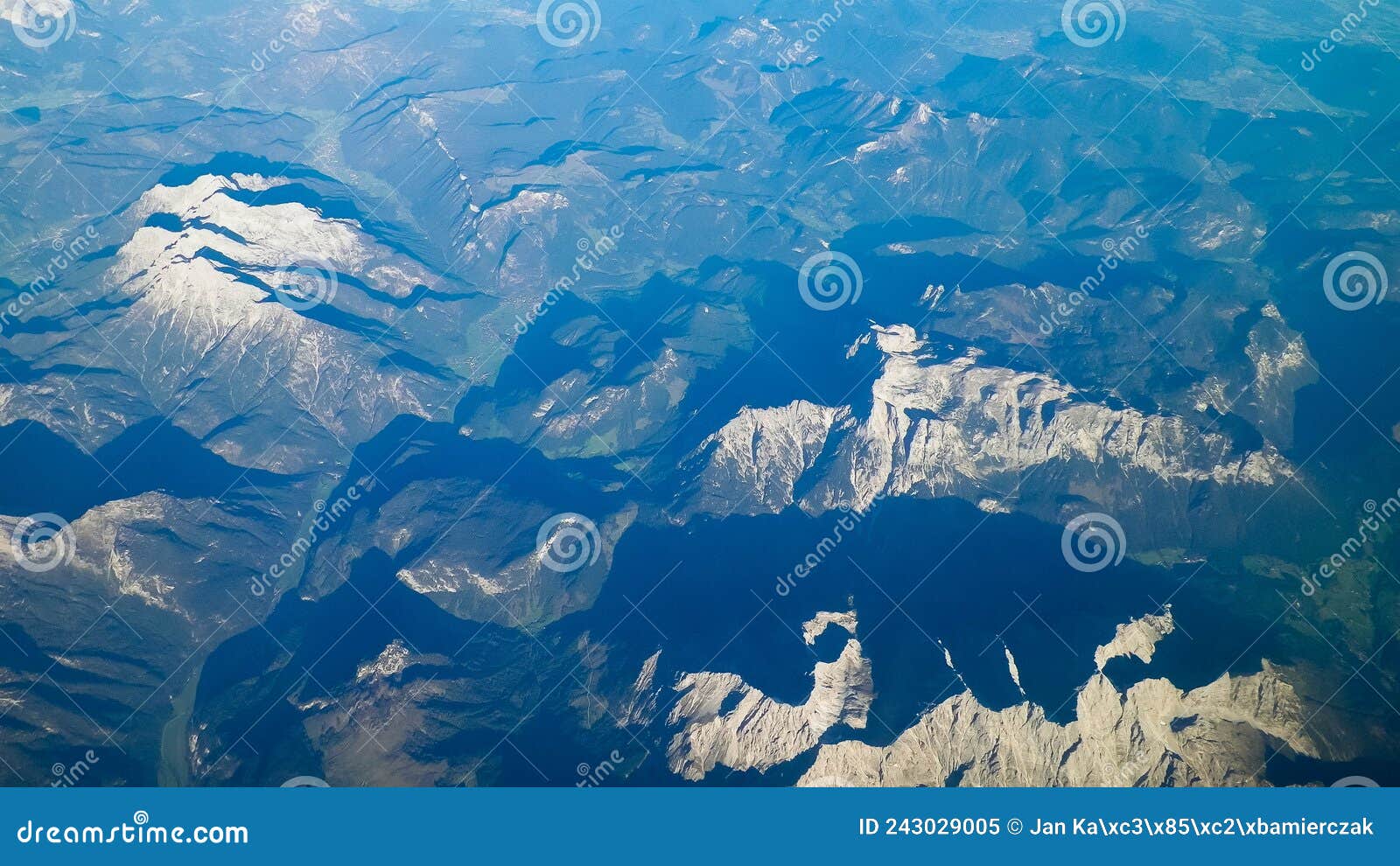 Alps from plane window stock image. Image of environment - 243029005