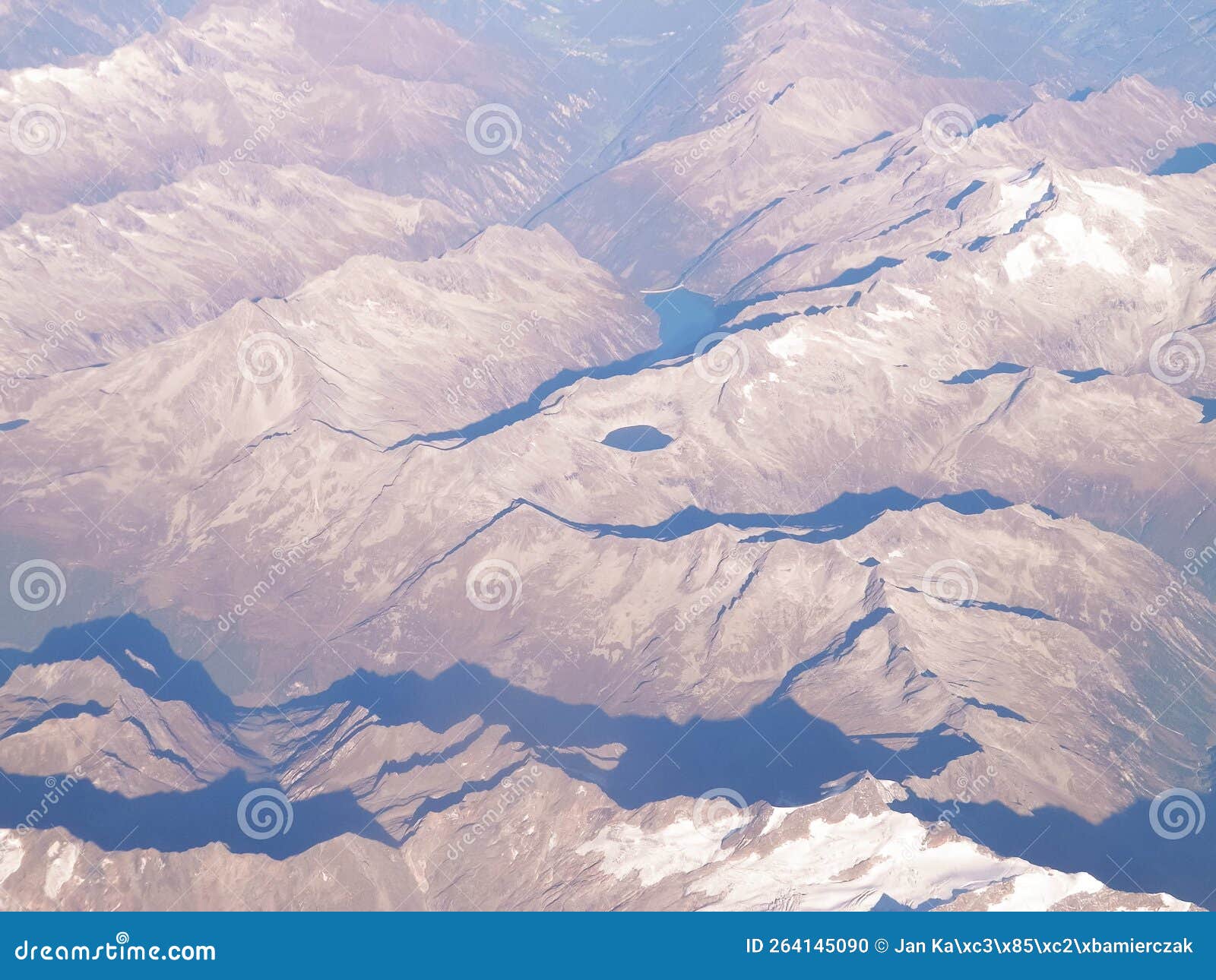 Alps from plane window stock photo. Image of outdoor - 264145090
