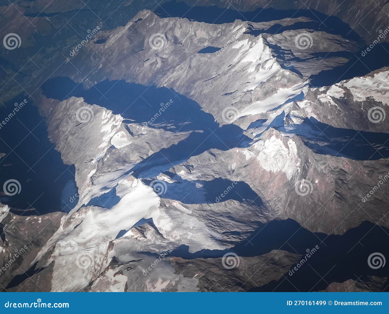 Alps from plane window stock image. Image of rock, alps - 270161499