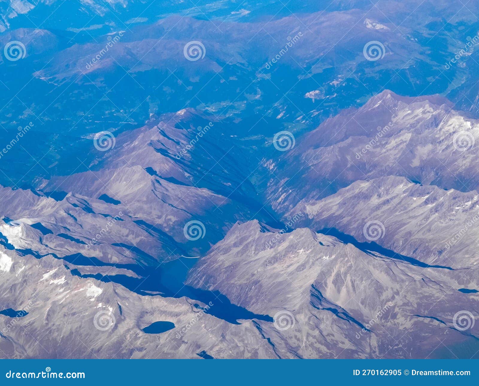 Alps from plane window stock image. Image of bending - 270162905