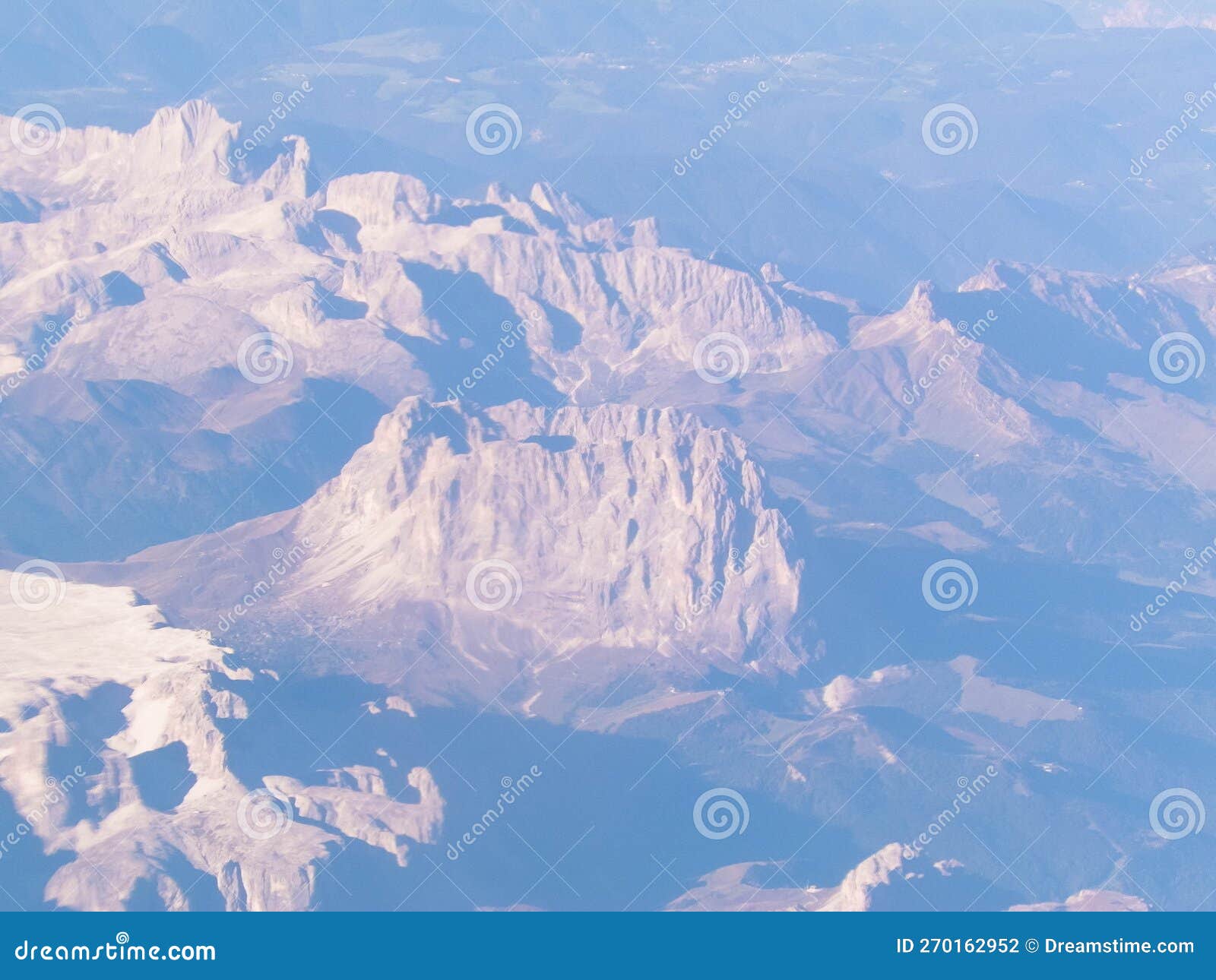 Alps from plane window stock photo. Image of mountains - 270162952