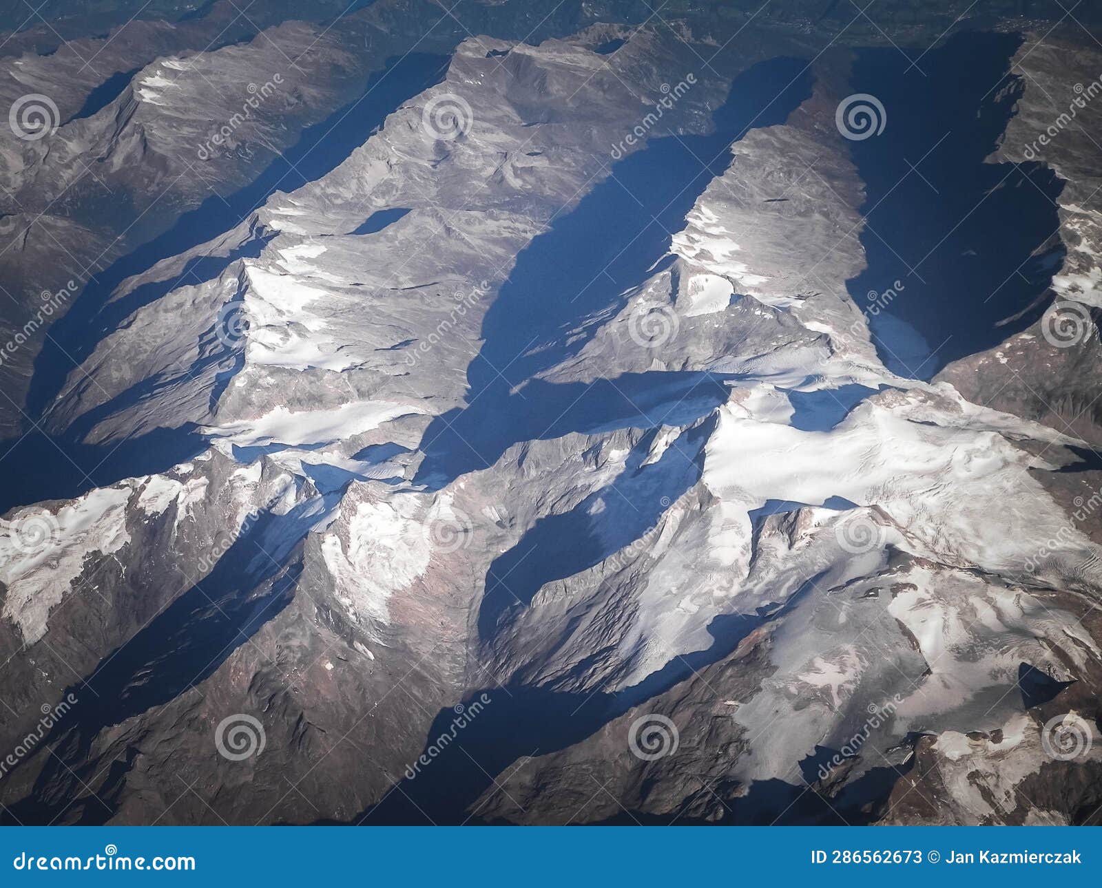 Alps from plane window stock image. Image of nature - 286562673