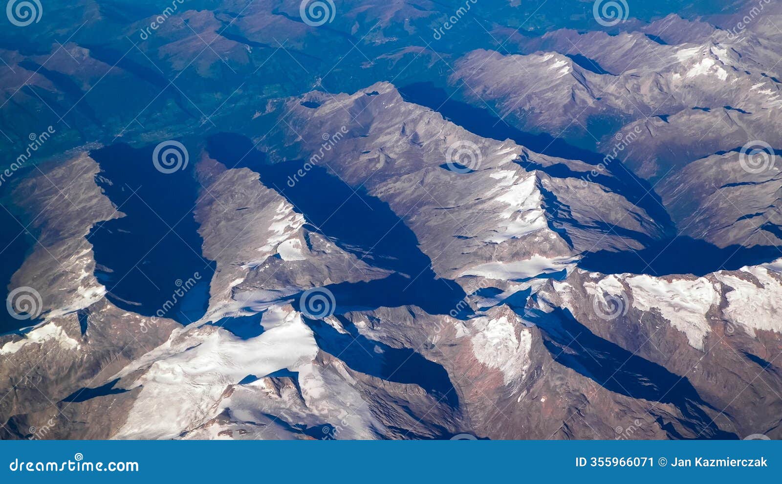 Alps from plane window stock image. Image of plane, gray - 355966071