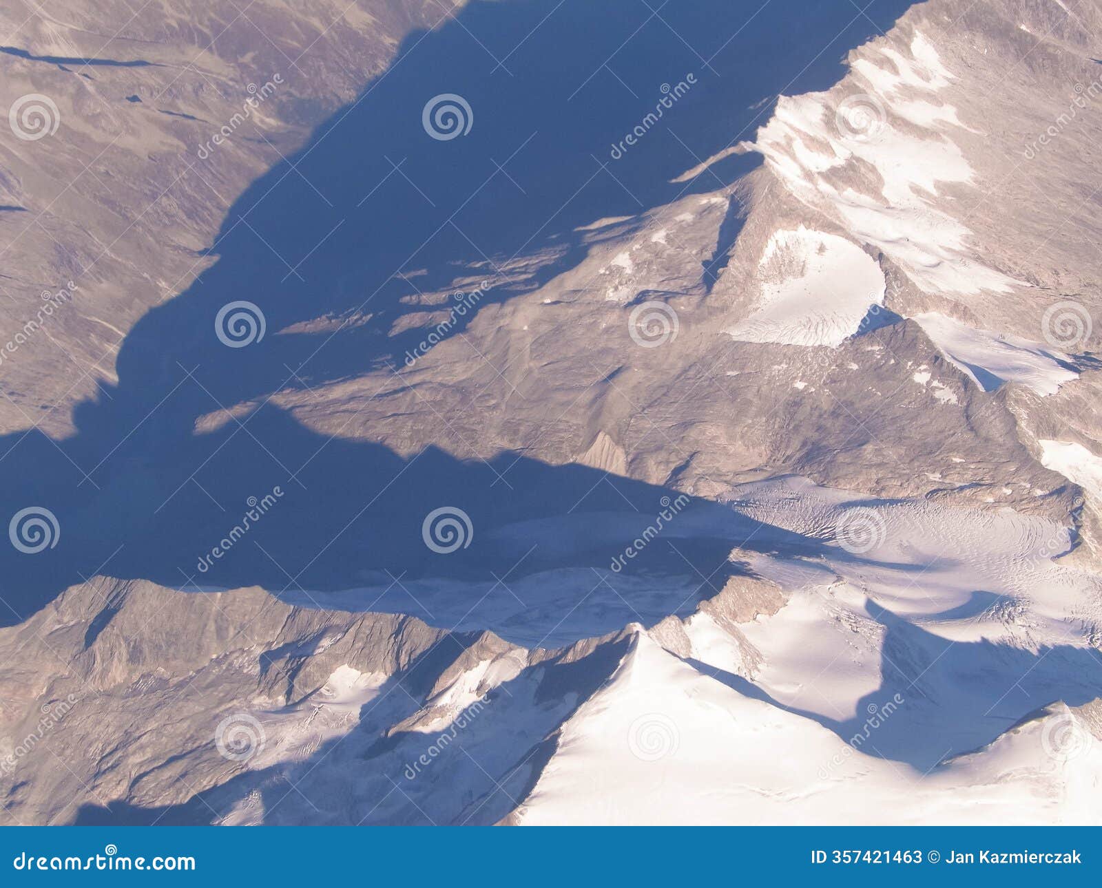 Alps from plane window stock image. Image of alps, europe - 357421463