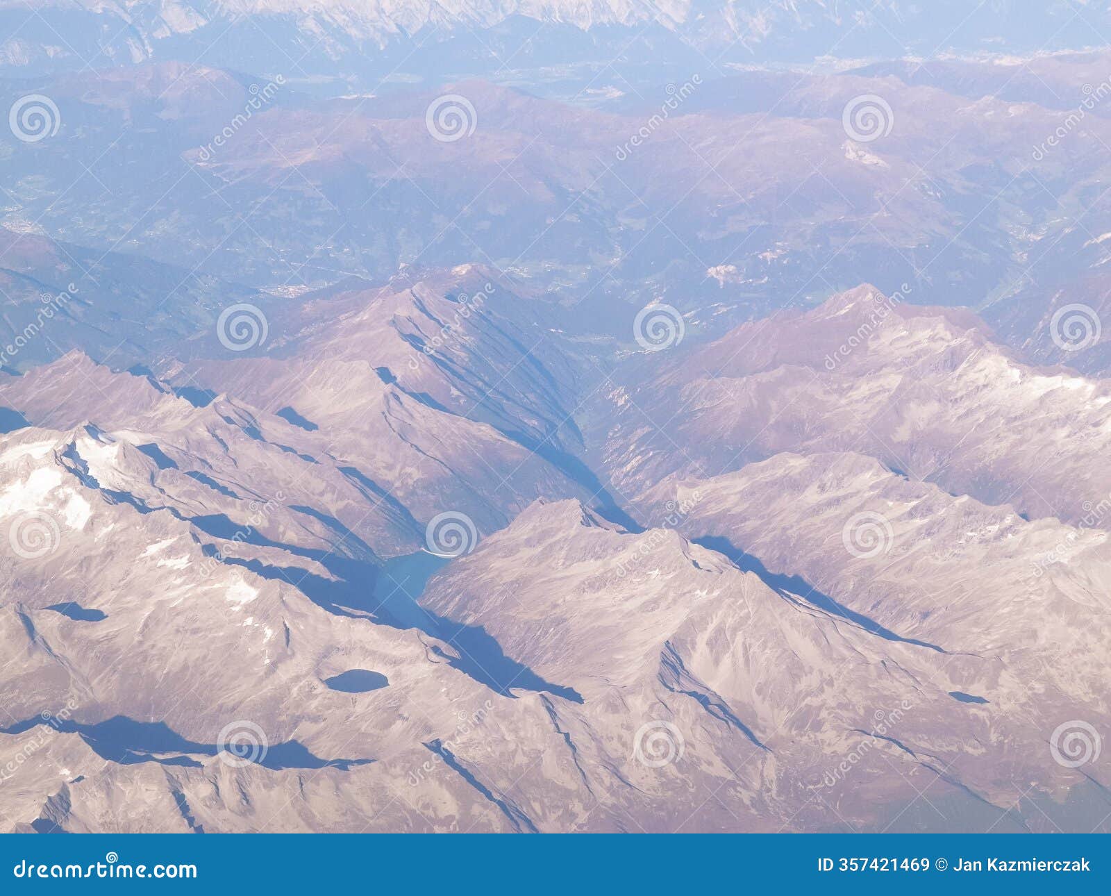 Alps from plane window stock image. Image of plane, hill - 357421469