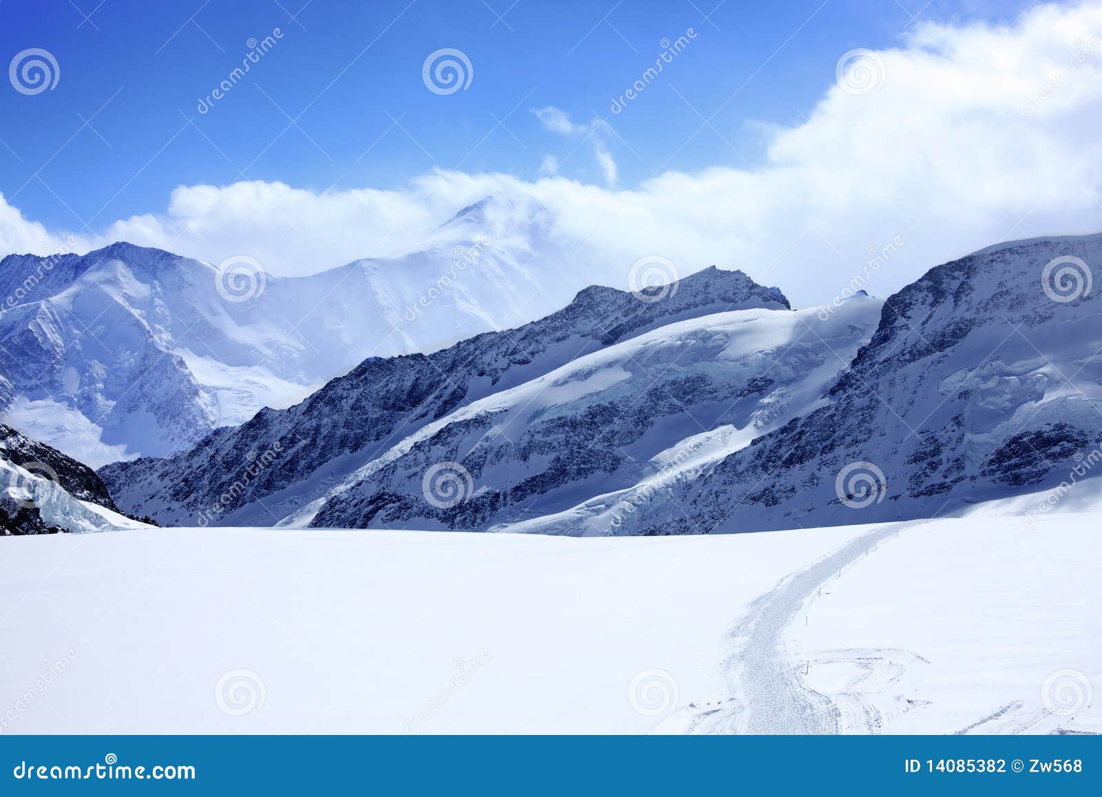 Alps under blue sky stock photo. Image of adventurist - 14085382
