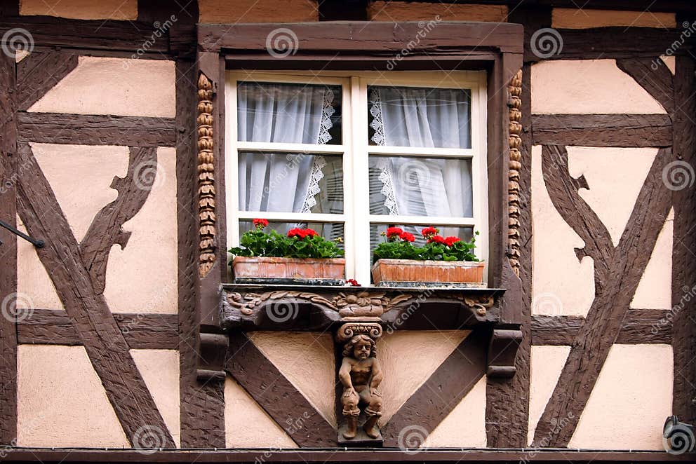Alsatian window stock image. Image of relief, flowers - 1138639