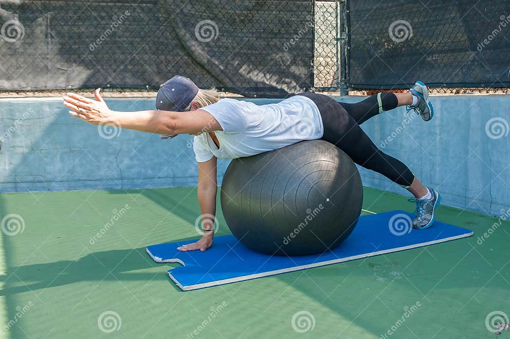 Alternate Superman Exercise Stock Image - Image of ball, control: 52787809