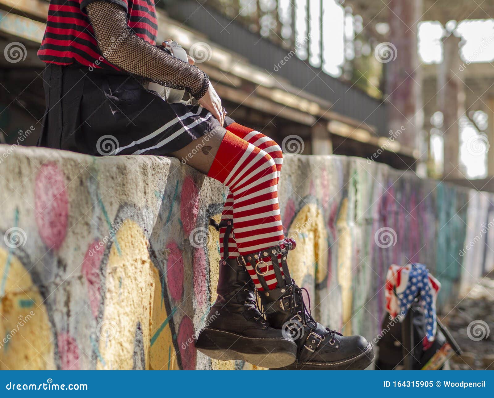 Alternative Emo Girl with Striped Stockings and Hell Boots on a ...