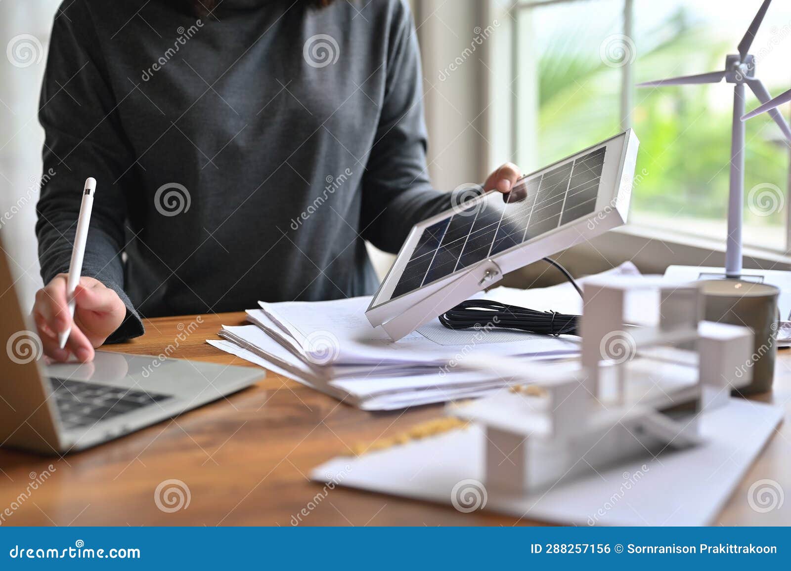 Alternative Energy Engineers Hold Solar Panel Samples while Learning ...