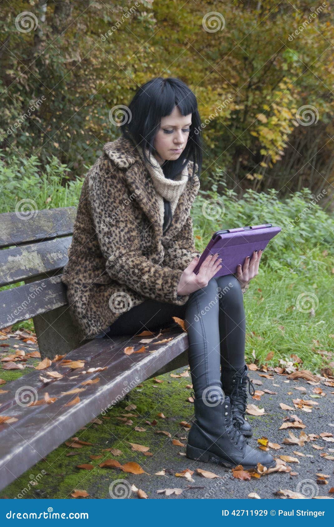 Alternative Model Sat on Bench with Tablet PC Stock Image - Image of ...