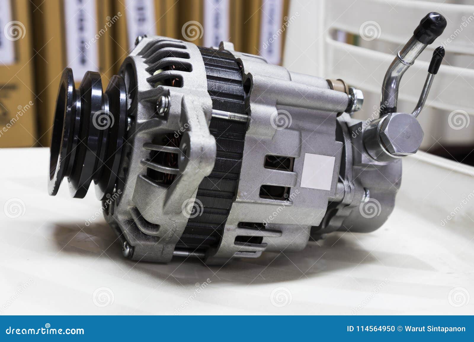 An alternator of engine stock photo. Image of background - 114564950