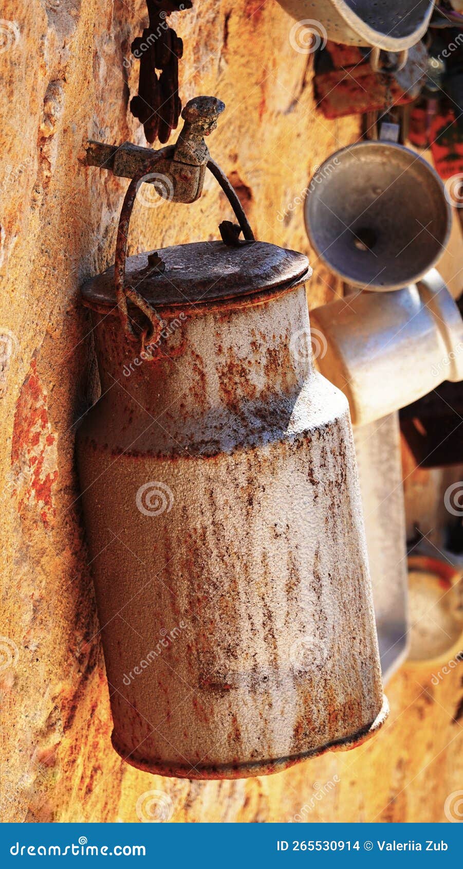 Aluminium Milk Can Hanging on the Wall. Grunge Rusty Milk Churn Stock ...