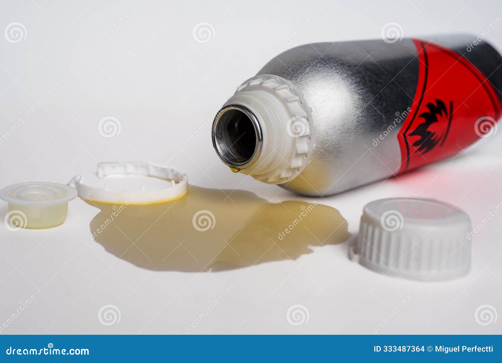 Aluminum Bottle for Sampling with a Label for Flammable Liquids Lying ...