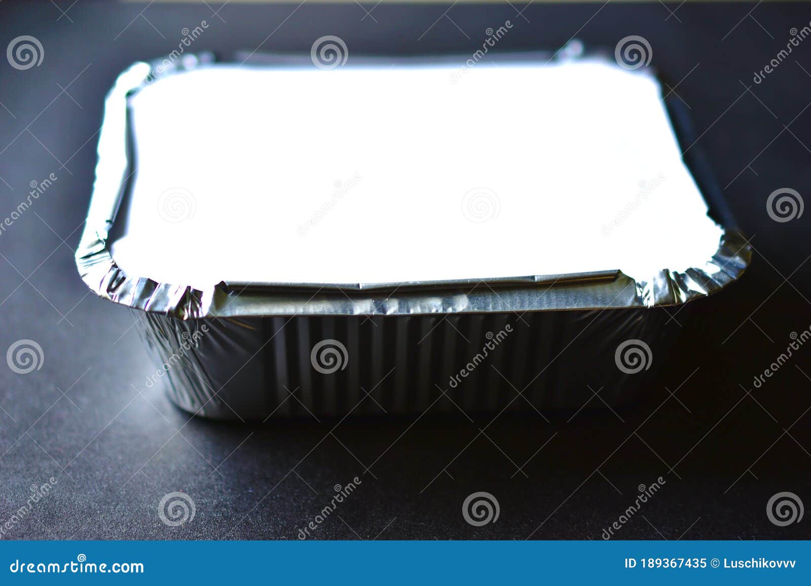 Aluminum Container with Food and White Sauce with a Jar Stock Image ...