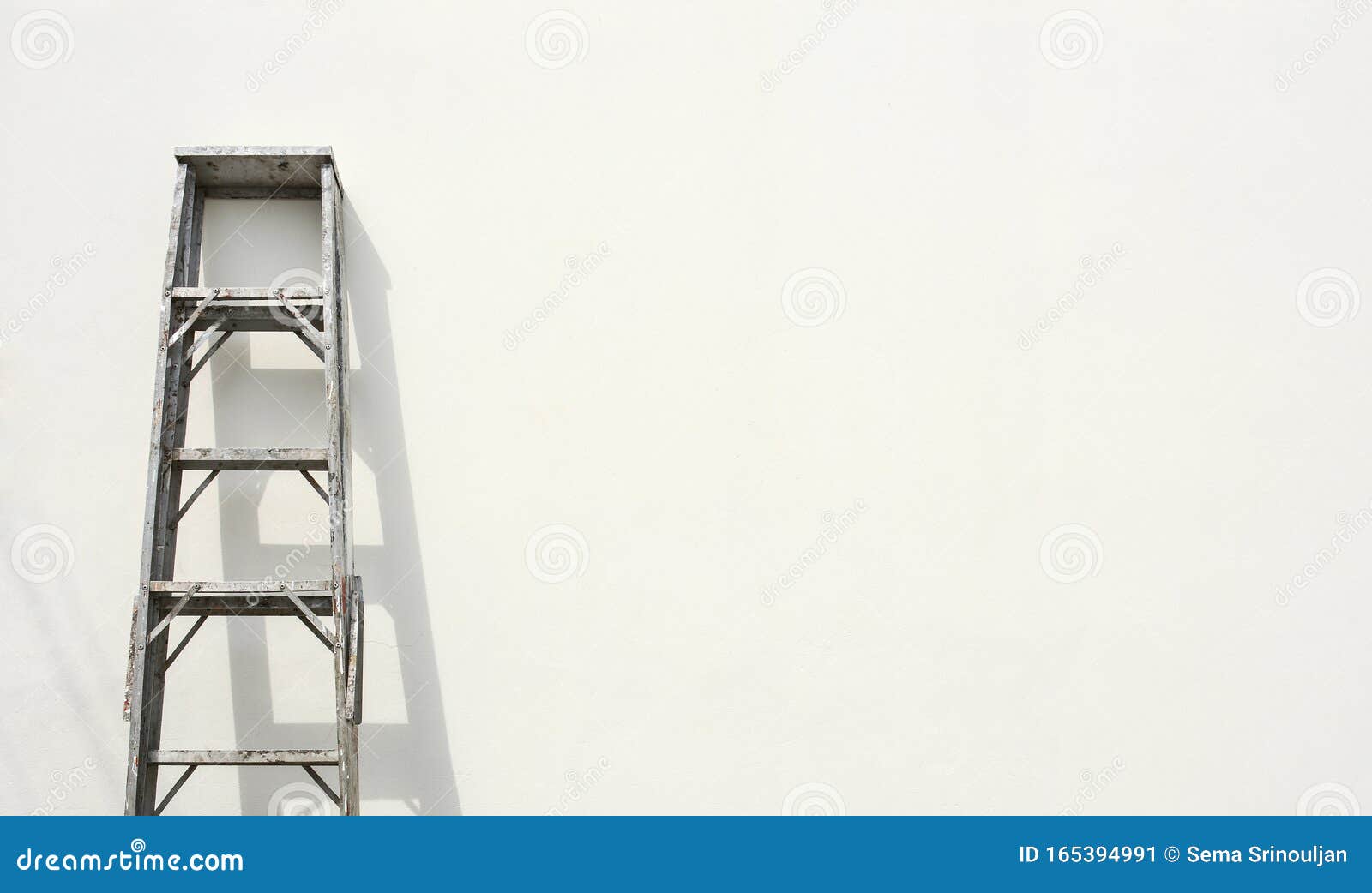 An Aluminum Foldable Ladder On The Wall Royalty-Free Stock Photography ...