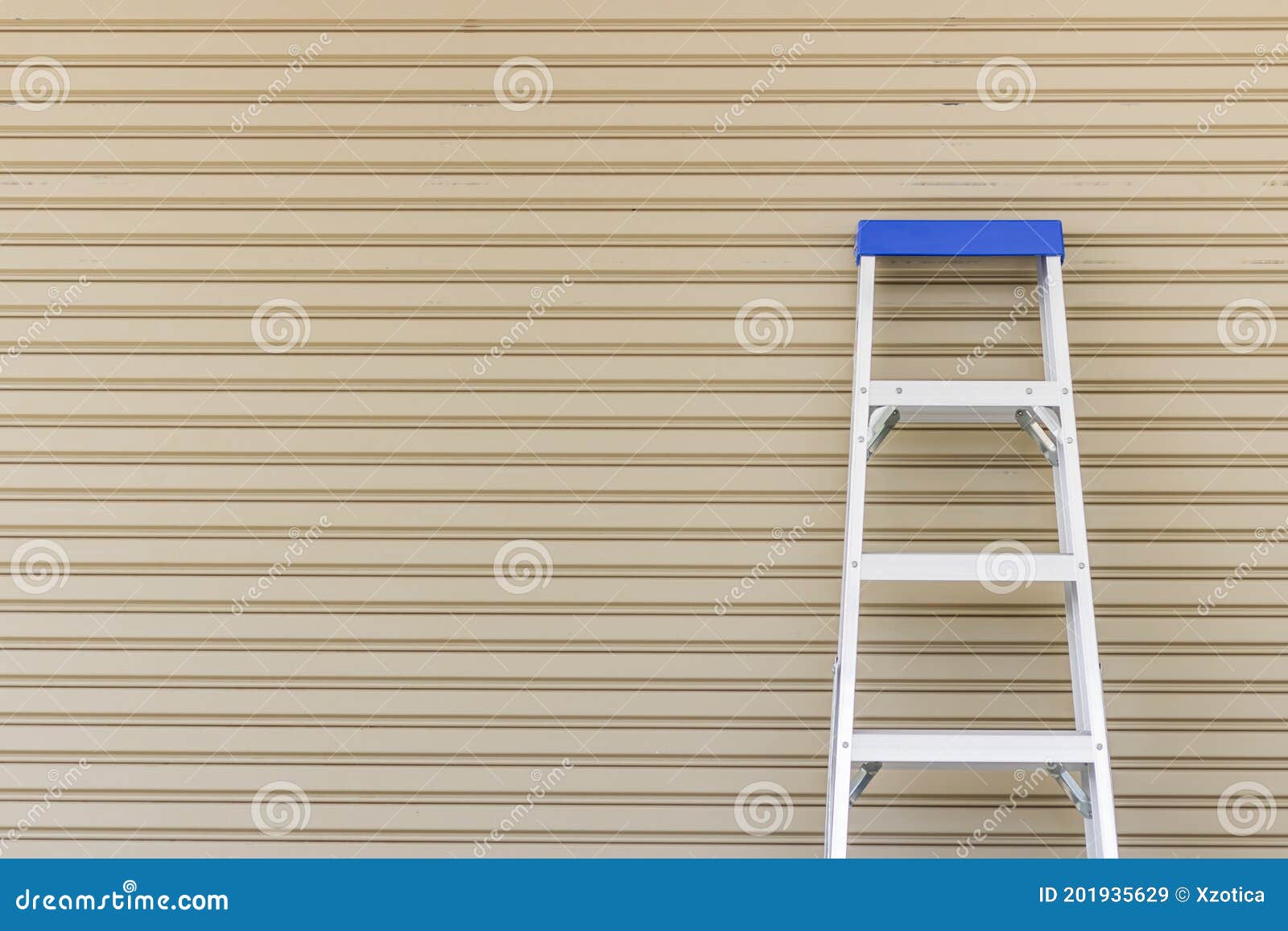 An Aluminum Foldable Ladder On The Wall Royalty-Free Stock Photography ...