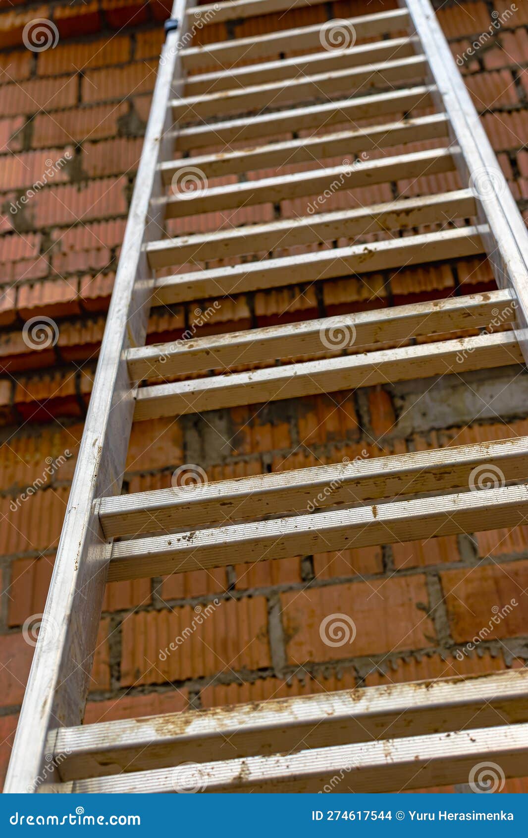 Aluminum Ladder At The Construction Site Against The Background Of A ...