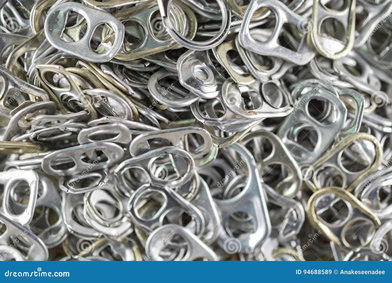 Aluminum pull tabs stock image. Image of recycle, legs - 94688589