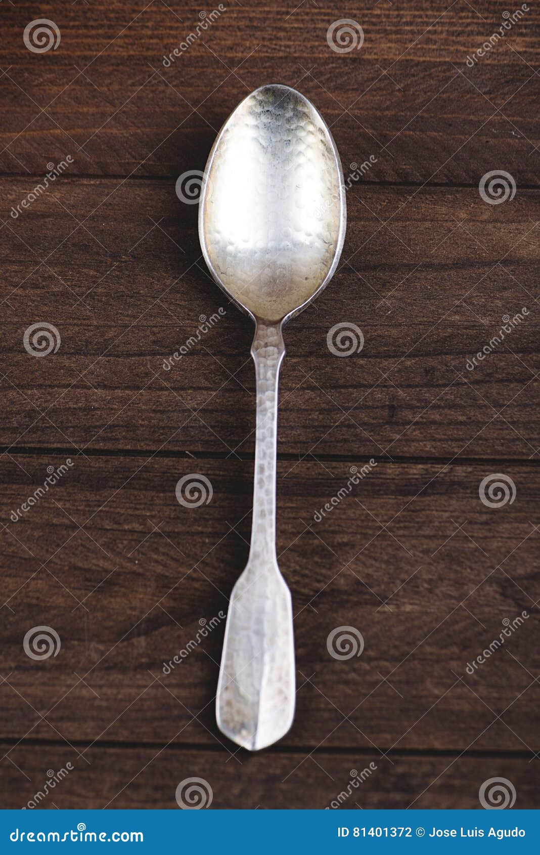 Aluminum Spoon Laying on Wooden Table Stock Photo - Image of dining ...