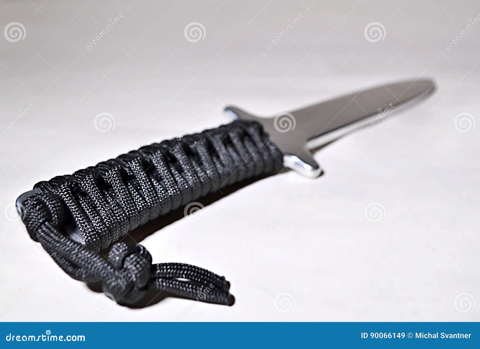 Aluminum Training Knife with Rope Handle on White Background Stock ...