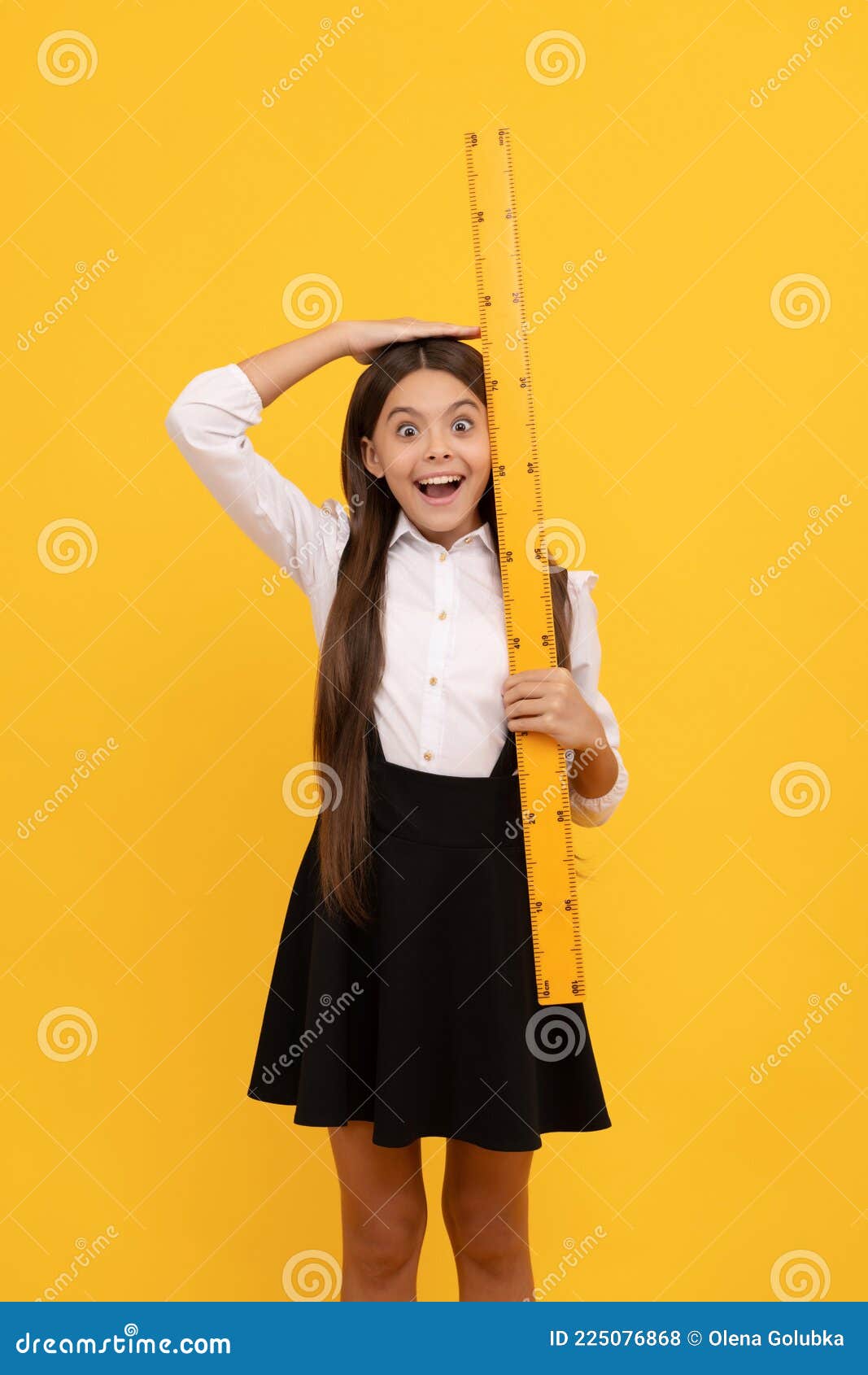 Amazed Child in School Uniform Hold Mathematics Ruler for Measuring ...