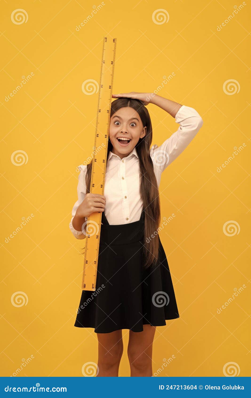 Amazed Child in School Uniform Hold Mathematics Ruler for Measuring ...