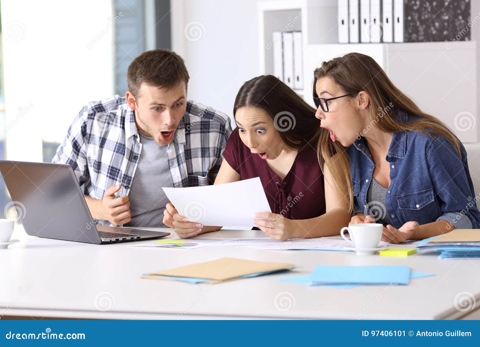 Amazed Employees Reading a Document at Office Stock Image - Image of ...