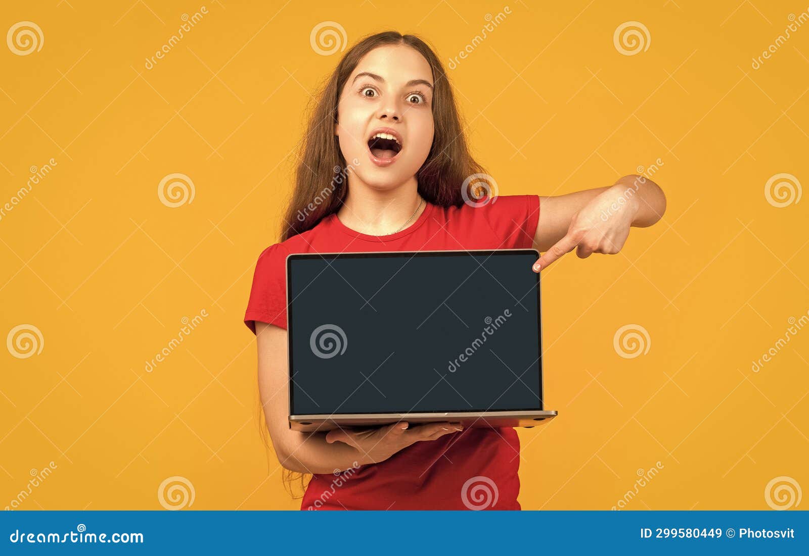 Amazed Kid with Laptop on Yellow Background Stock Image - Image of ...