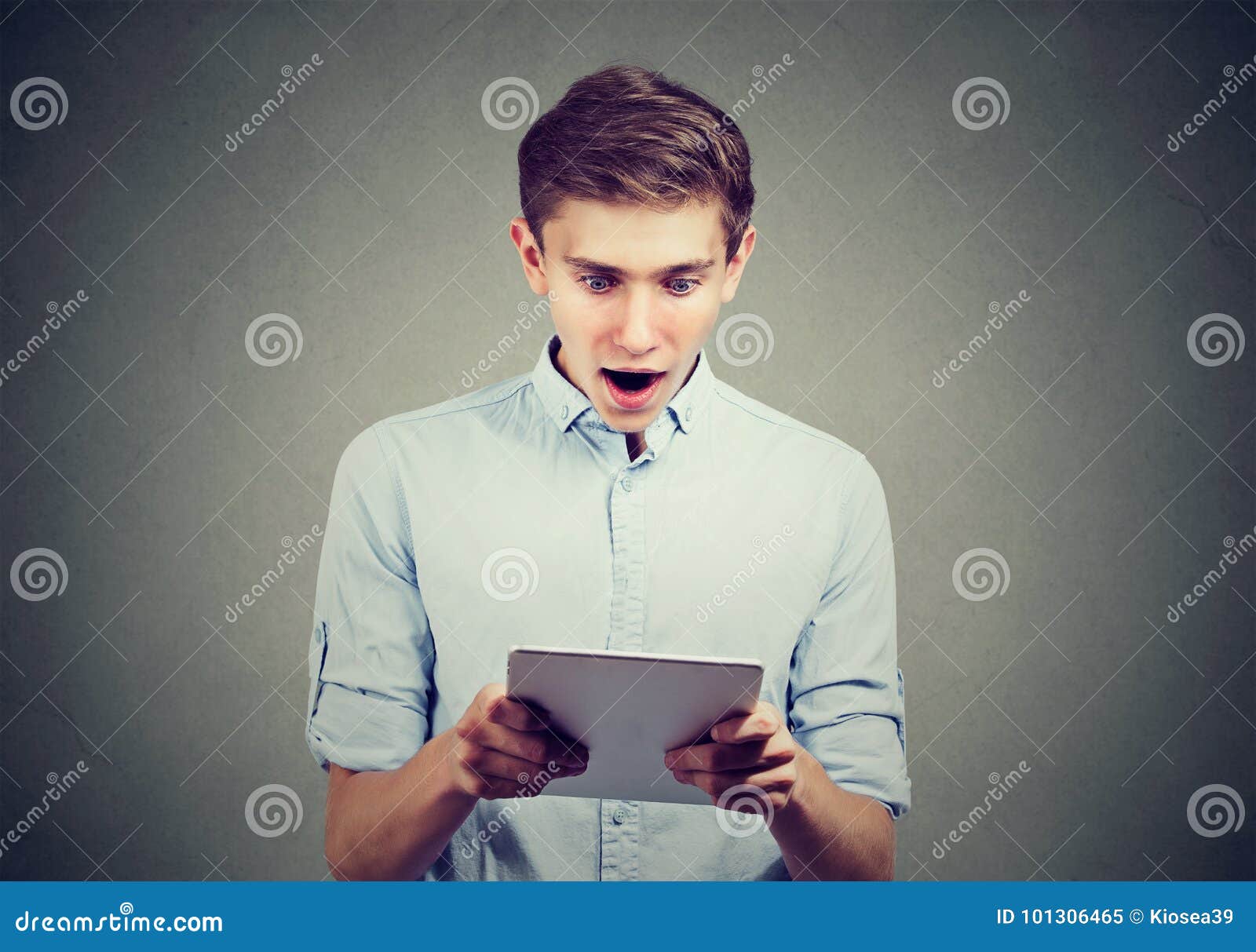 Amazed Man Looking at His New Tablet Computer Stock Image - Image of ...