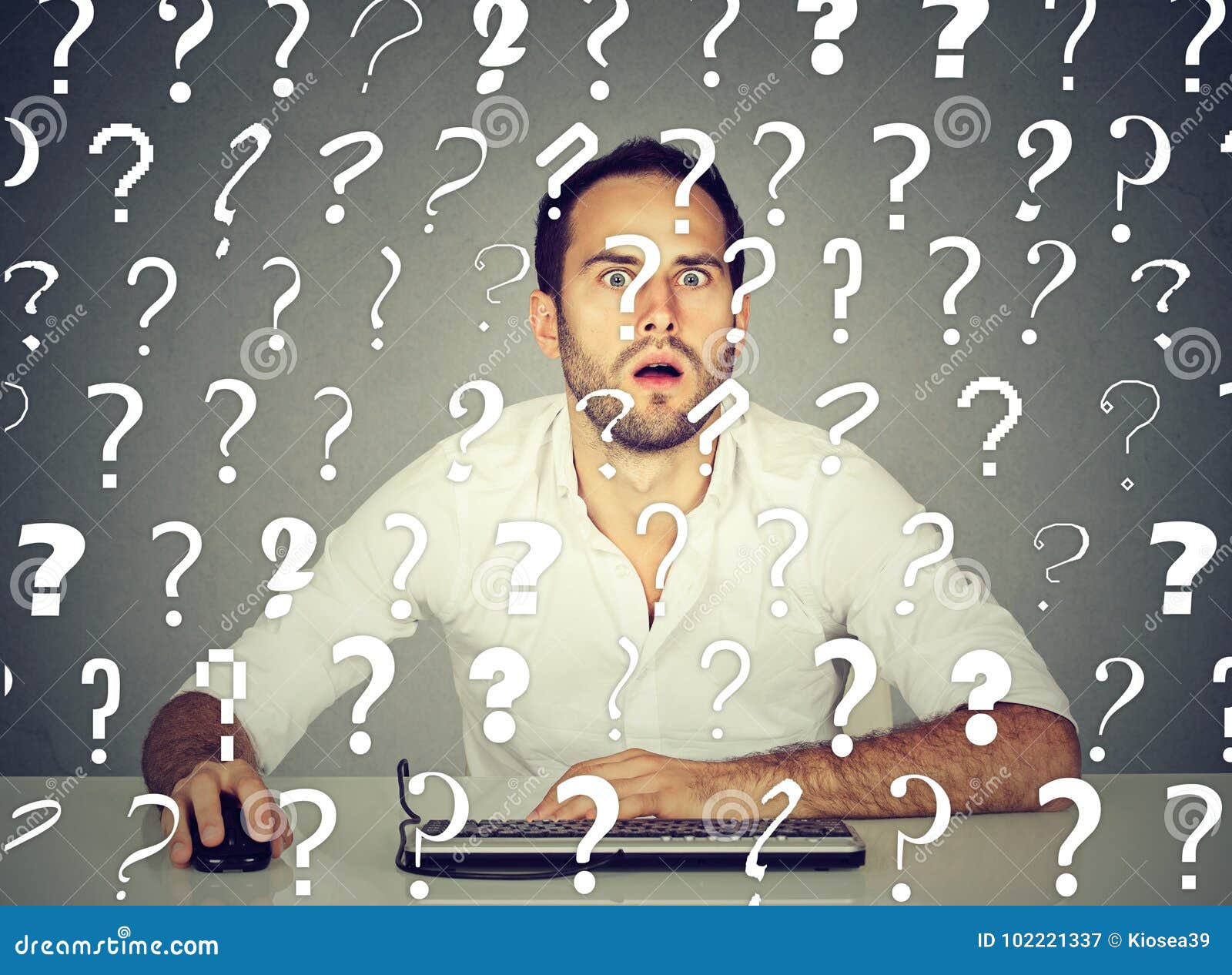 Perplexed Man Working on Desktop Computer Has Many Questions Stock ...
