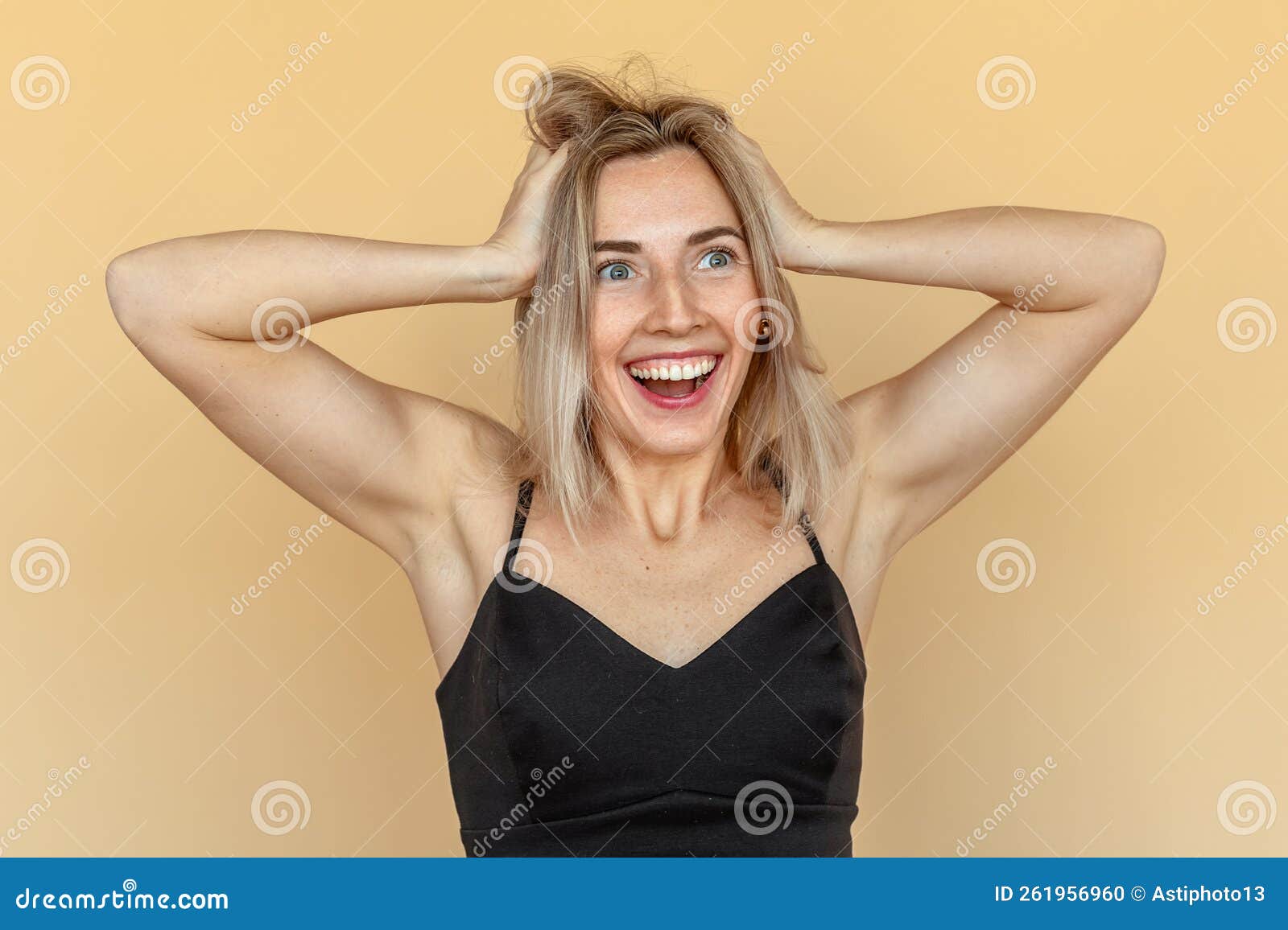 Amazed Pretty Young Woman With Freckles Touch Hands Hair Beautiful
