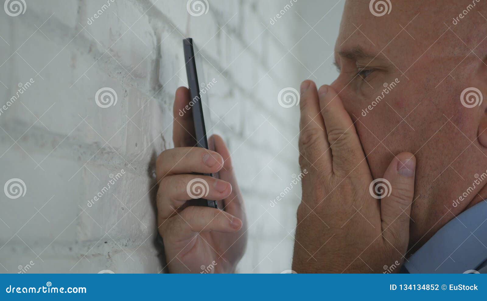 Amazed and Scared Businessman Reading a Cell Phone Text Stock Photo ...
