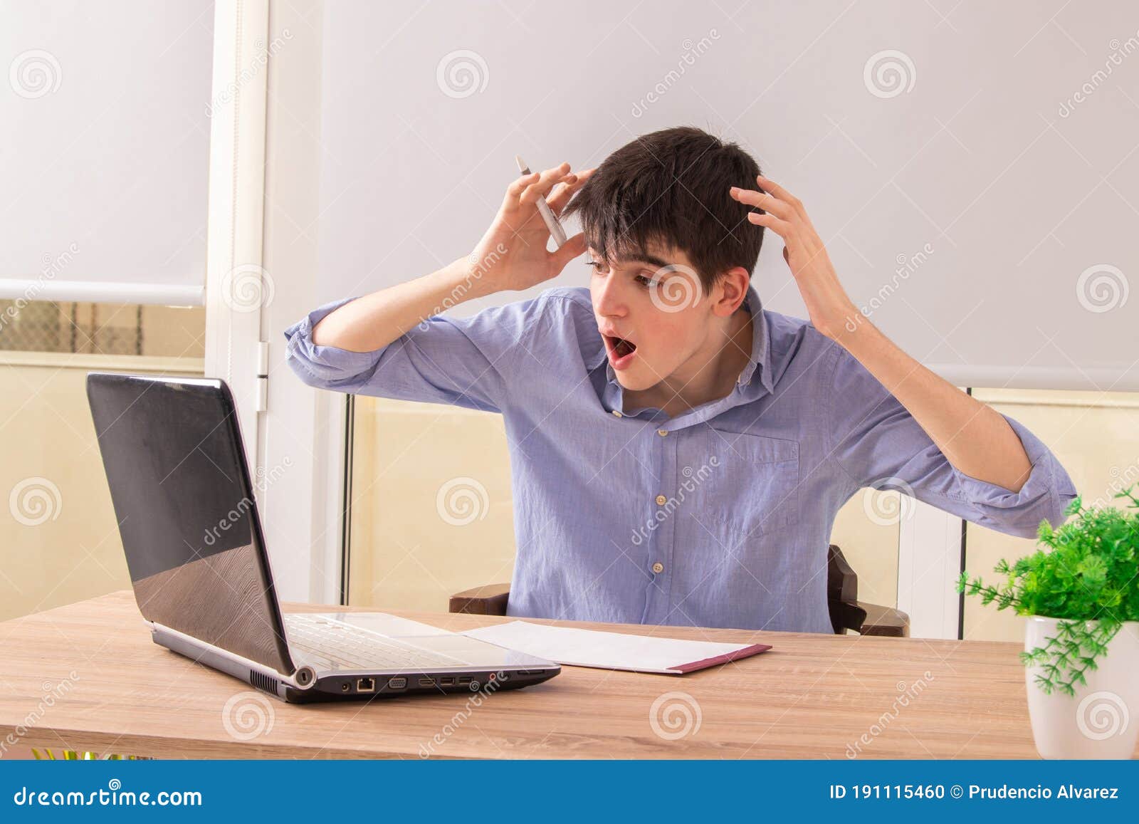 Scared Teenage Student at Desk with Computer Stock Photo - Image of ...