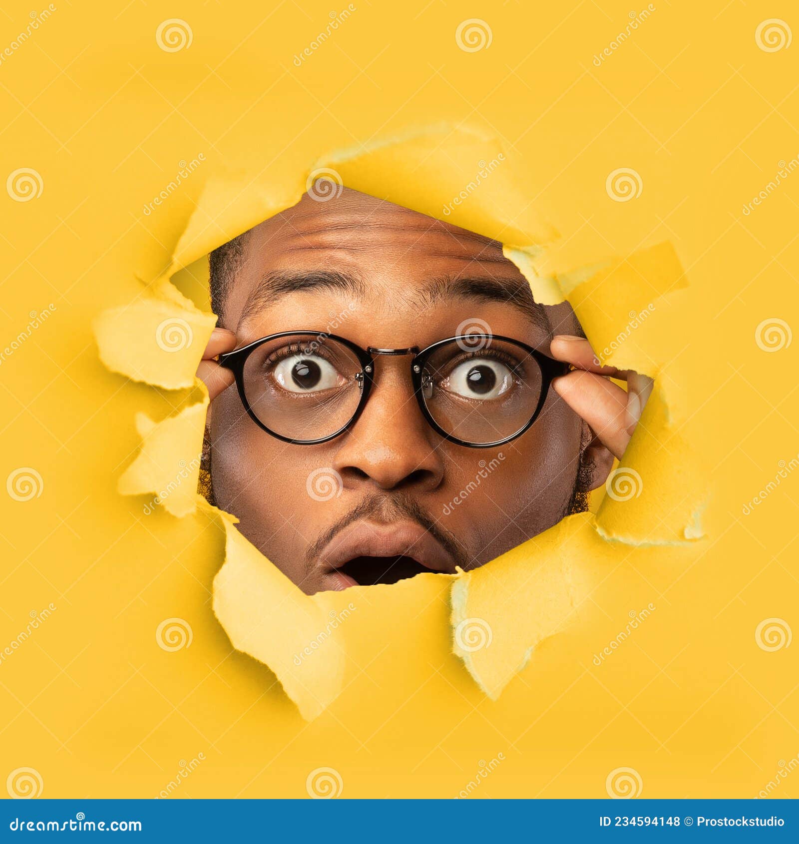 Amazed Shocked Millennial Black Male In Glasses Open Mouth Looks