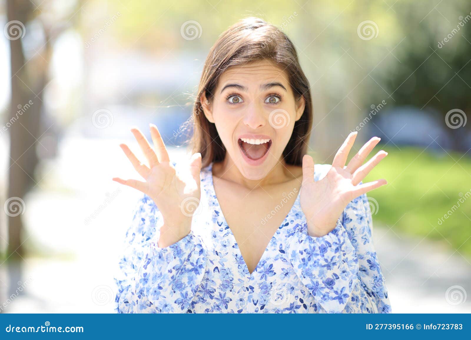 Amazed Woman Looking at Camera in the Street Stock Photo - Image of ...