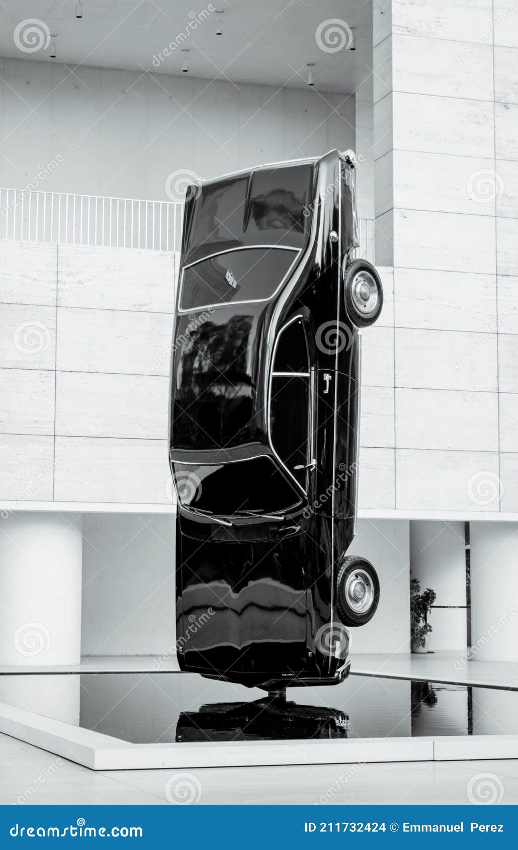 Vertical Of A Black Mercedes Driving On The Street Shot In Long ...