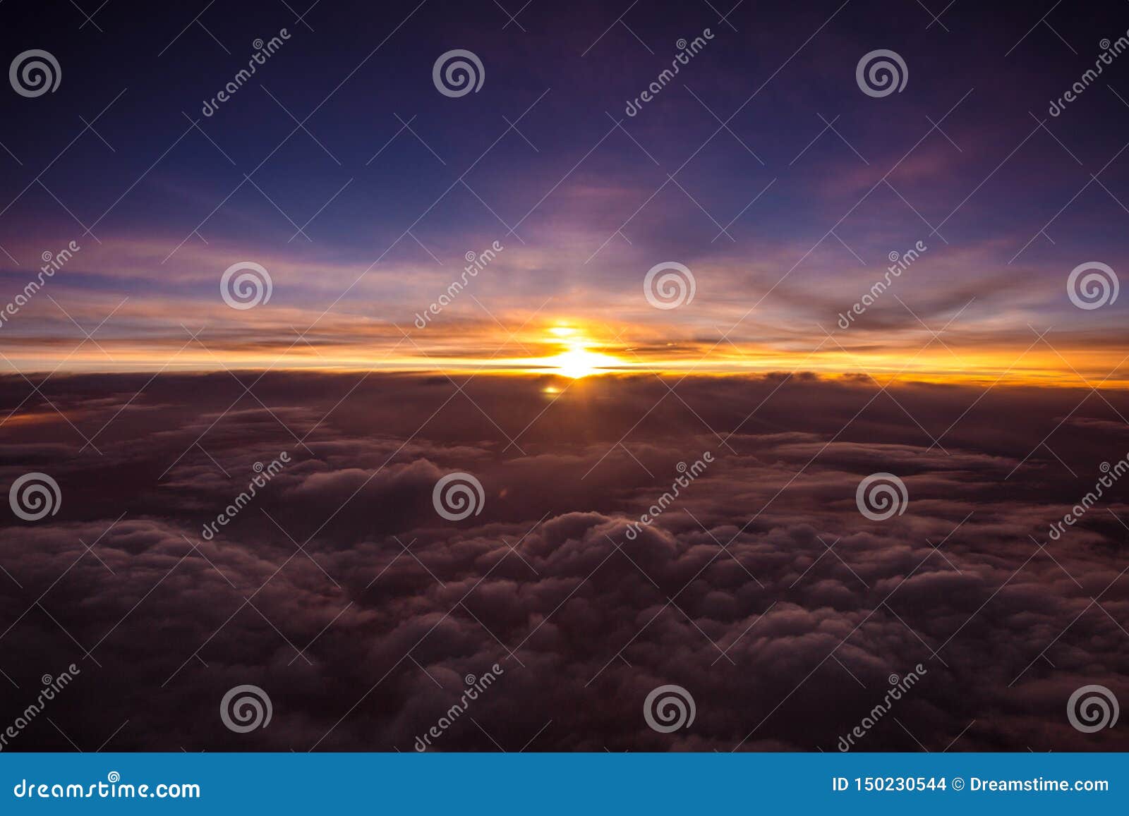 Amazing and Beautiful Sunset Above the Clouds with Dramatic Clouds ...