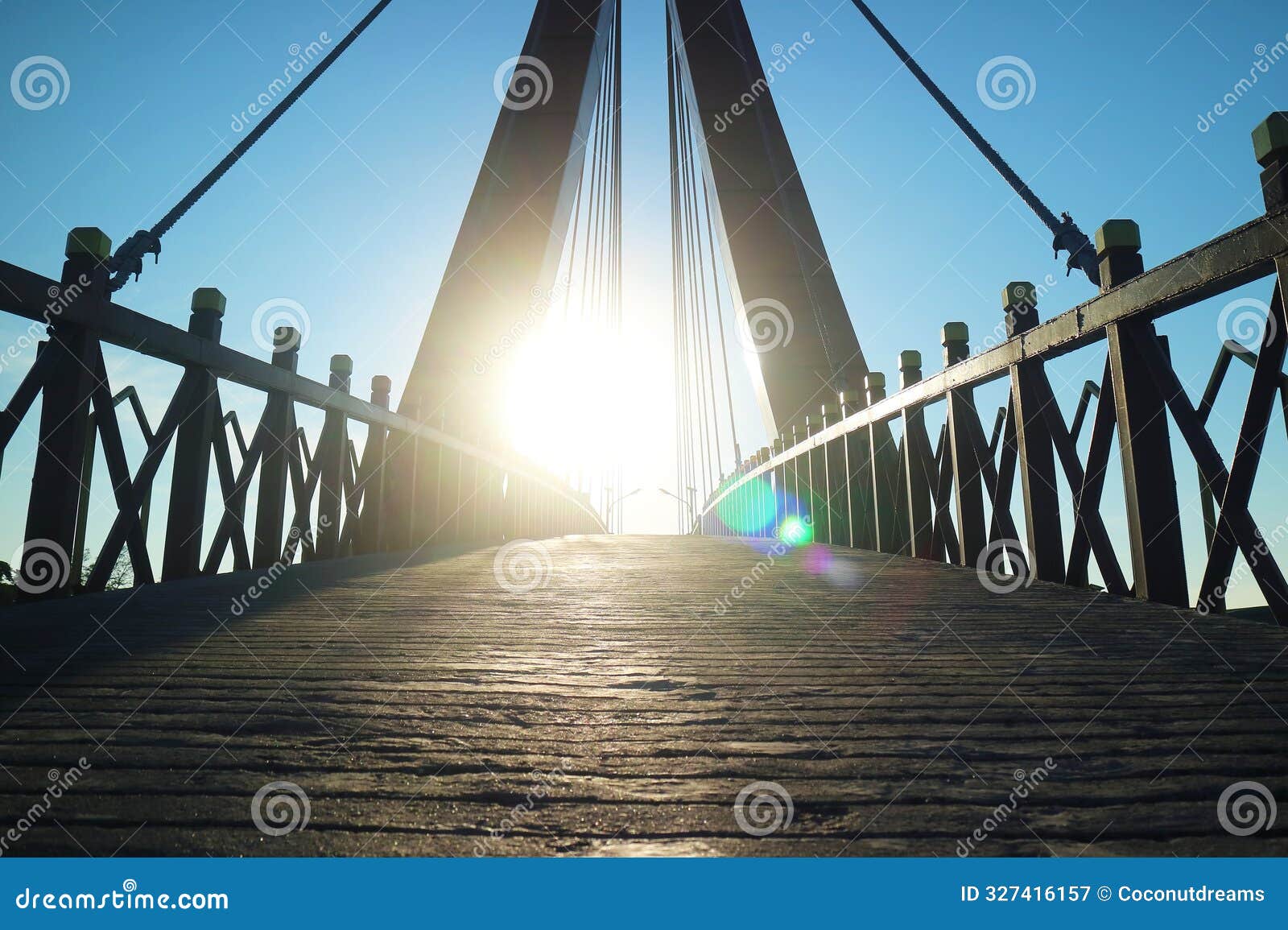 Bright Sun Rising Over the Suspension Bridge Stock Image - Image of ...