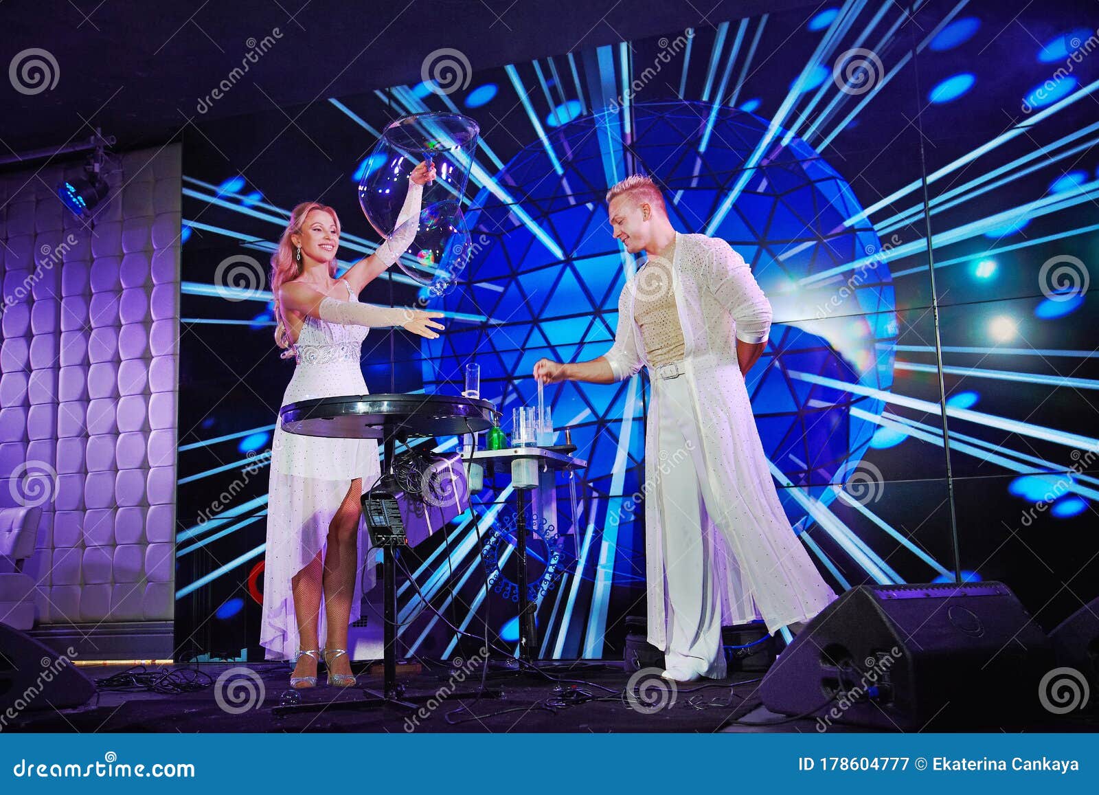 Amazing Bubble Show Performance with Two Artists, Lights, Smoke Stock ...