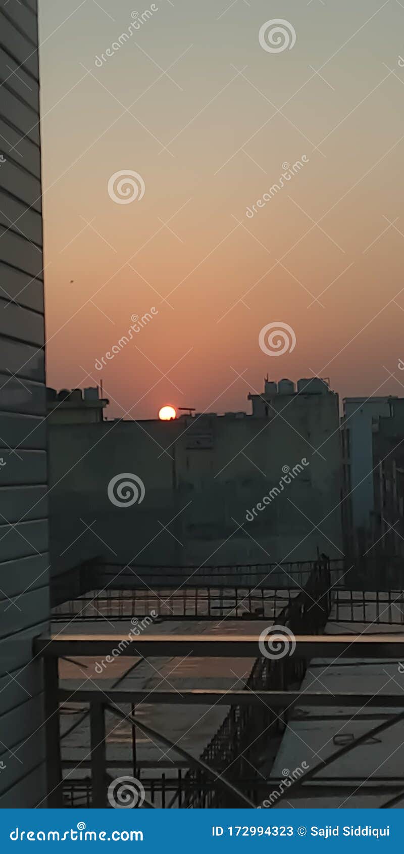 An Amazing Closeup View of Sunrise Behind the Building Stock Image ...